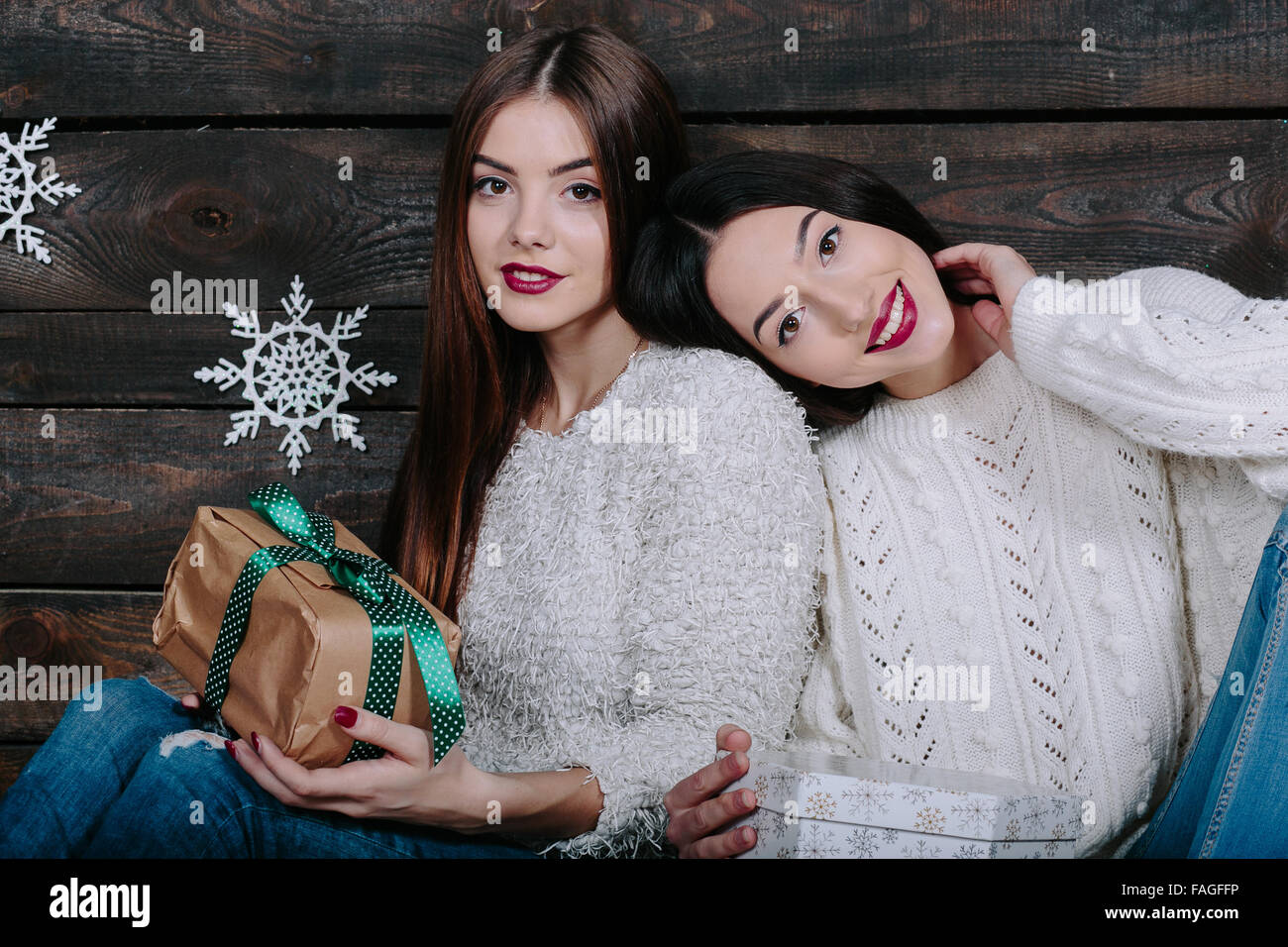 portrait of two beautiful girls at Christmas Stock Photo - Alamy