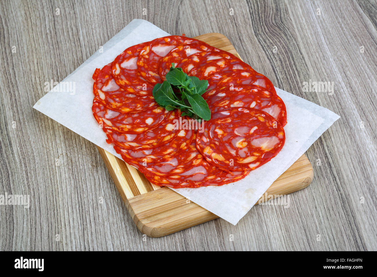 Traditional Spanish salami - Chorizo sausage on the wood background ...