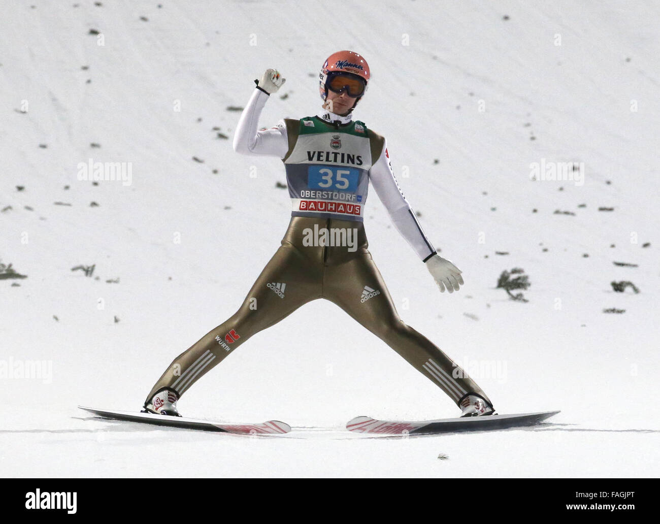 Oberstdorf, Germany. 29th Dec, 2015. Michael Neumayer of Germany reacts ...