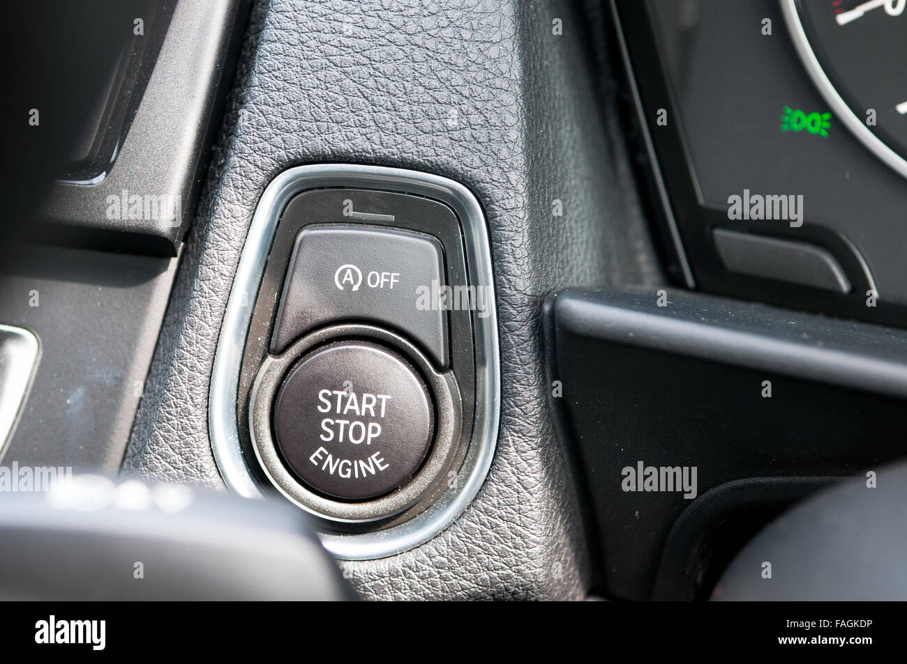 Detail on the start button in a car Stock Photo - Alamy