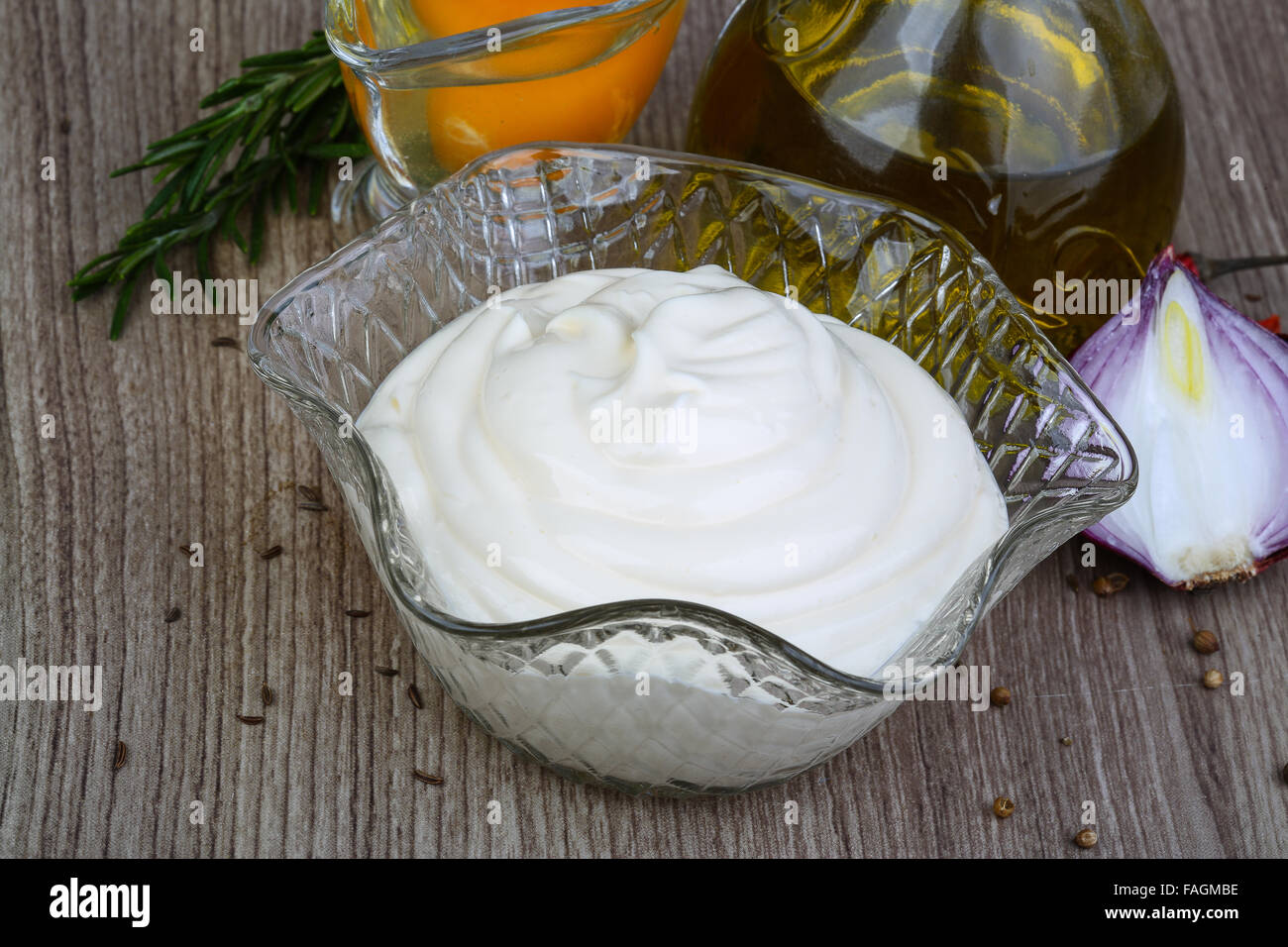 Mayonnaise sauce served raw egg, olive oil and rosemary Stock Photo - Alamy