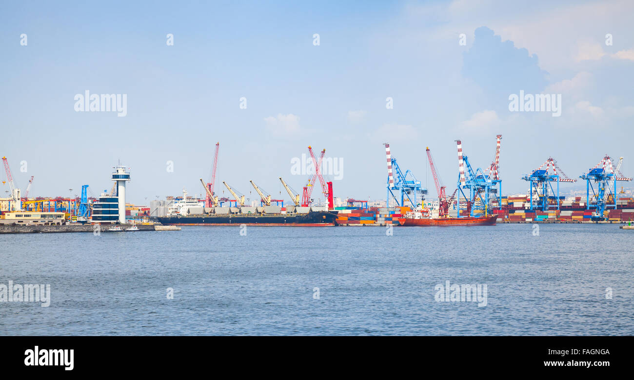 Italy. Port of Naples, coastal cityscape with cargo ships near ...