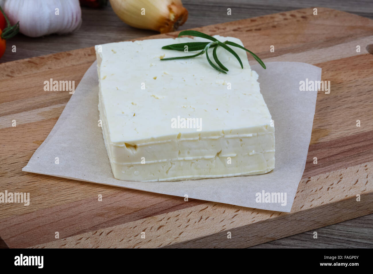Traditional Caucasian homemade Cheese Brinza with rosemary on wood ...