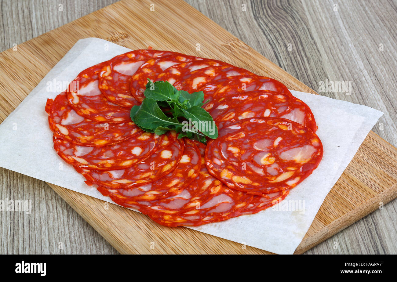 Traditional Spanish salami - Chorizo sausage on the wood background ...
