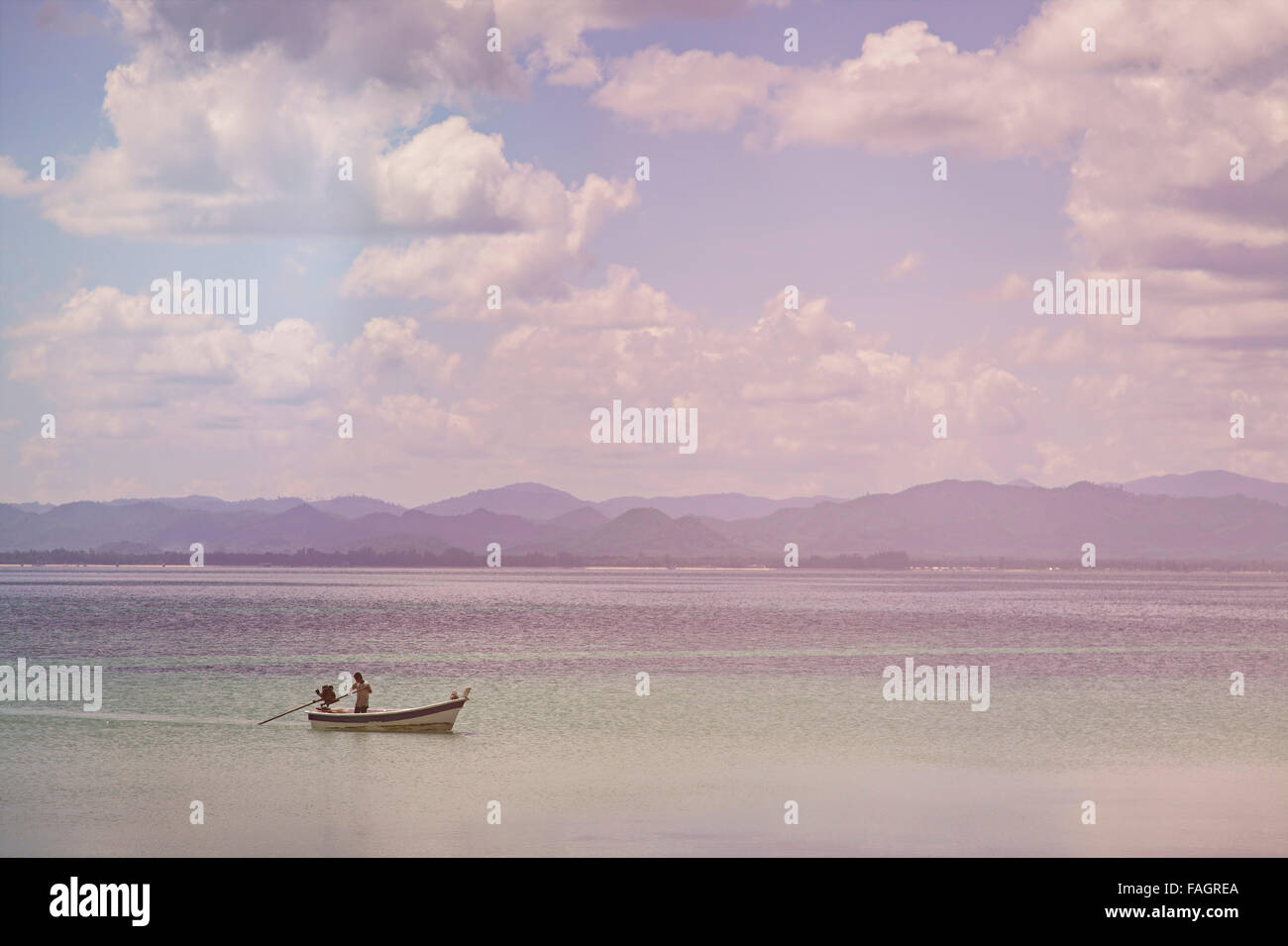 Image of one man in a small boat on the sea. Koh Talu, Thailand Stock ...