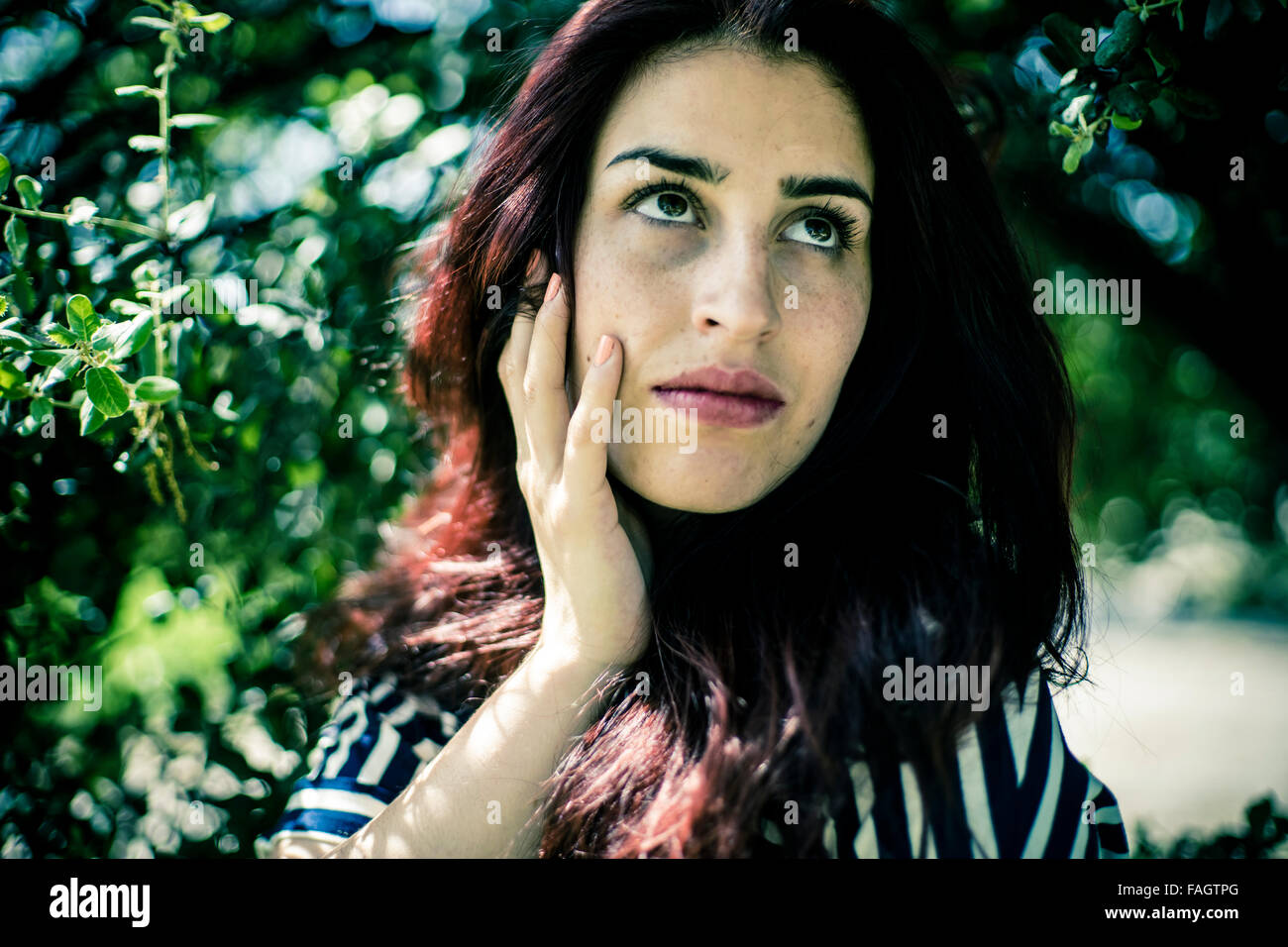romantic girl with branches of a tree in a park Stock Photo - Alamy