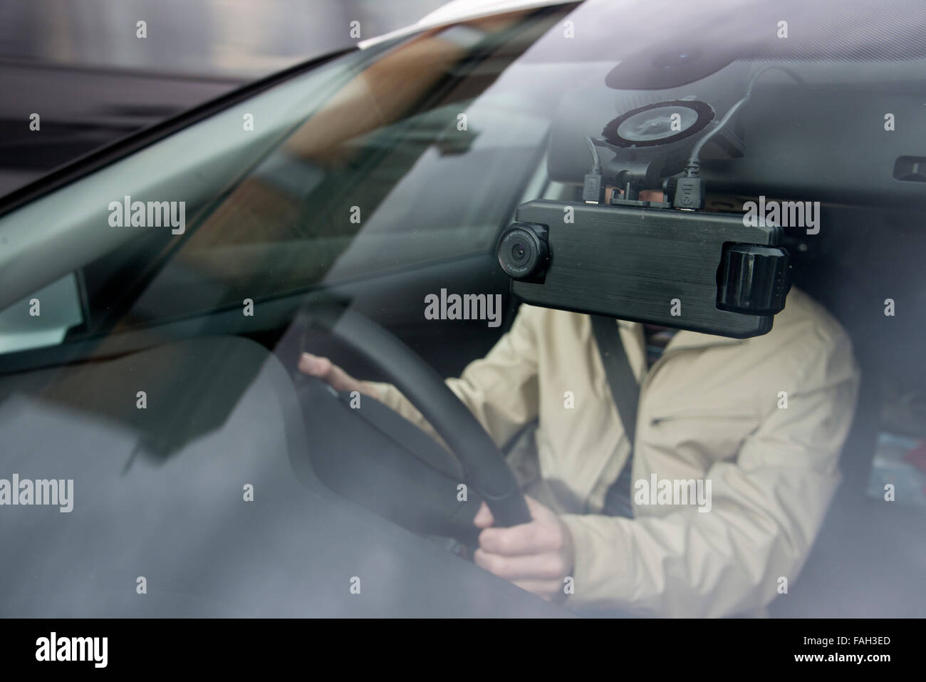 Driving a car with a dashcam video camera watching the road ahead Stock ...