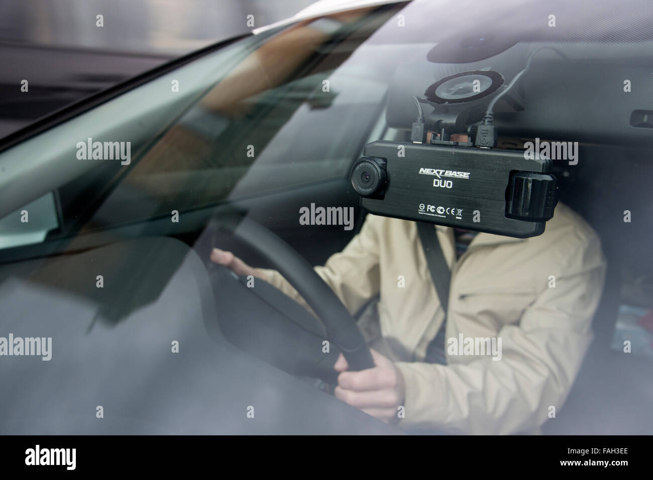 Driving a car with a dashcam video camera watching the road ahead Stock ...