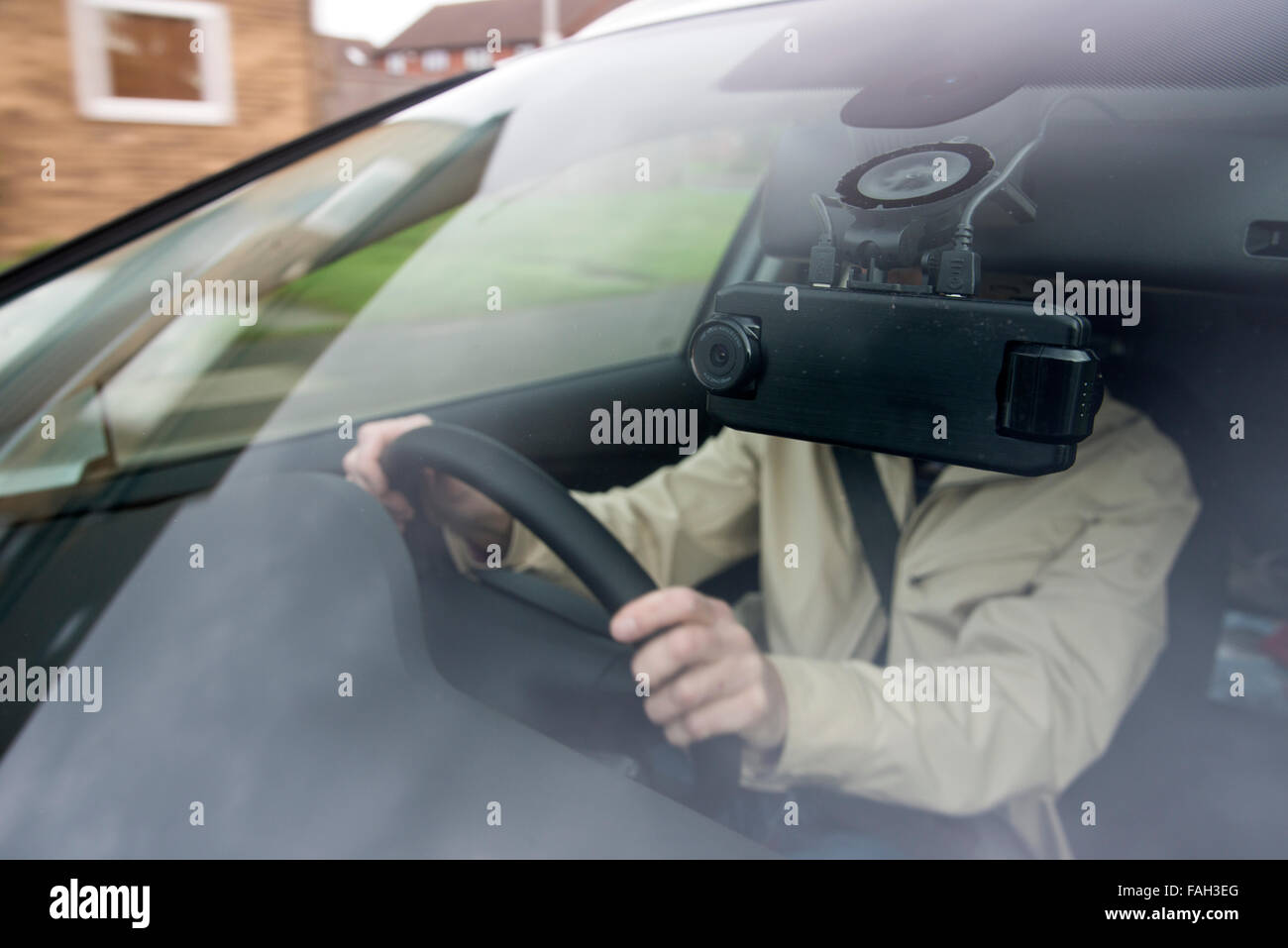 Driving a car with a dashcam video camera watching the road ahead Stock ...