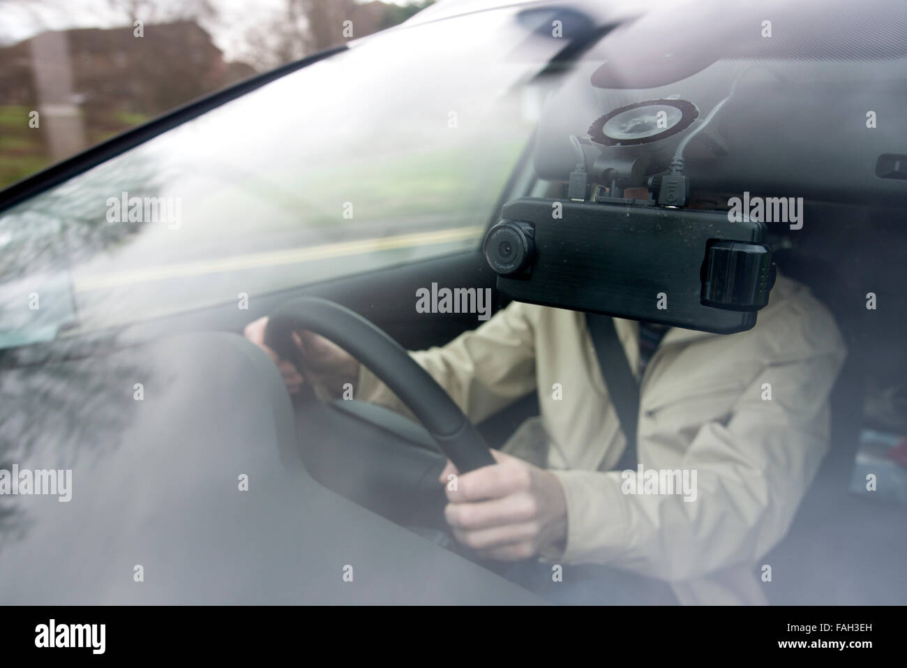 Driving a car with a dashcam video camera watching the road ahead Stock ...