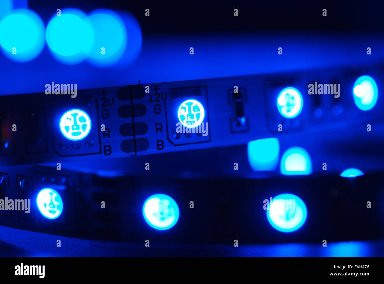 Blue led strip on the black background Stock Photo - Alamy