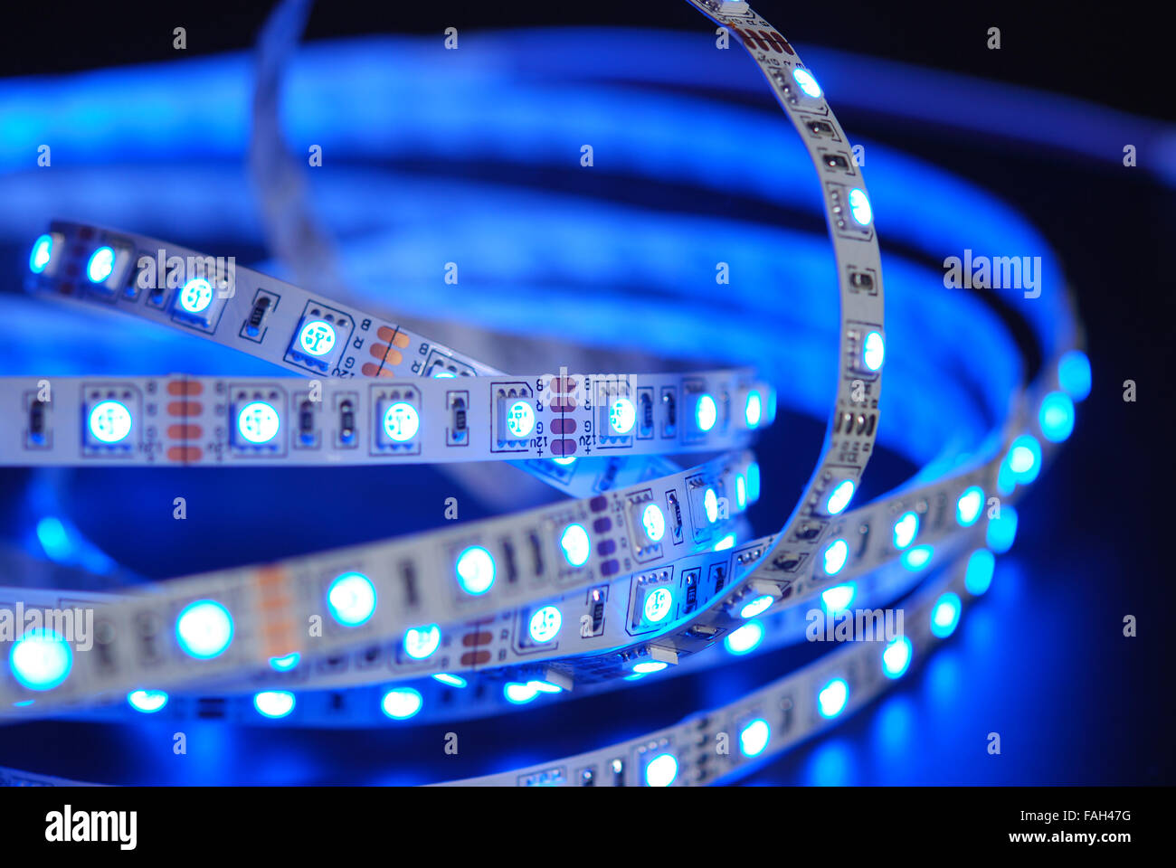 Blue led strip on the black background Stock Photo - Alamy