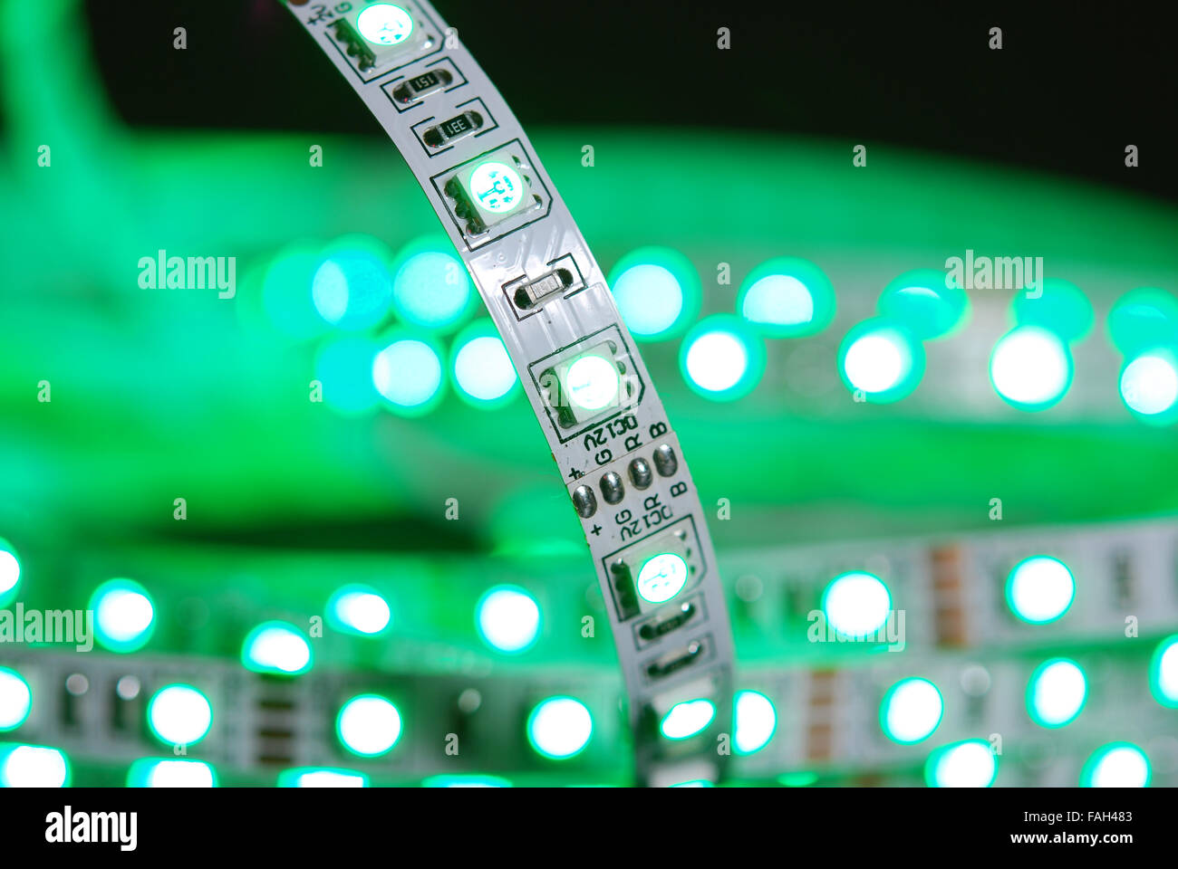 Green led strip on the black background Stock Photo - Alamy