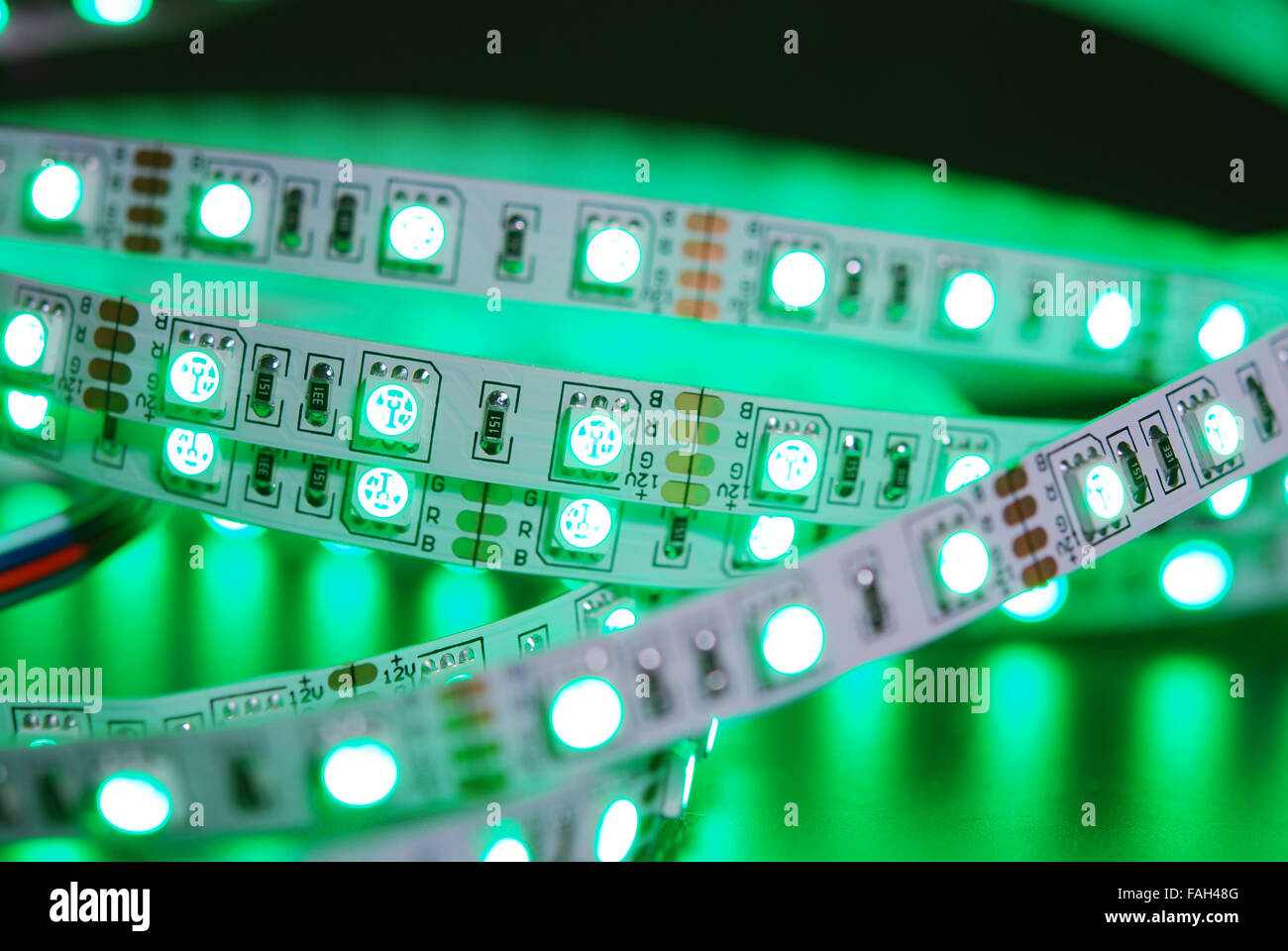 Green led strip on the black background Stock Photo - Alamy