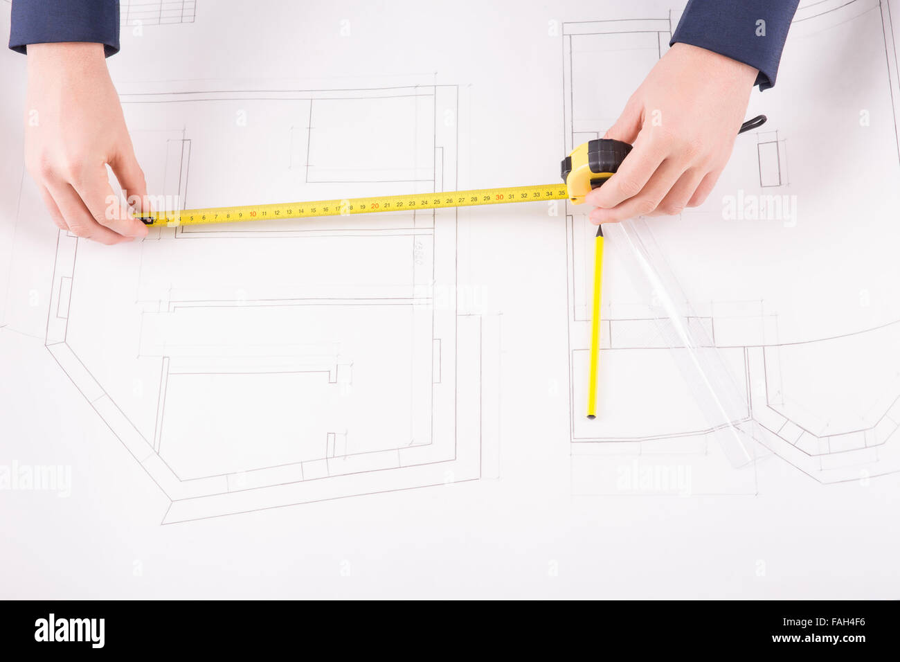 Male hands scaling a project drawing Stock Photo - Alamy