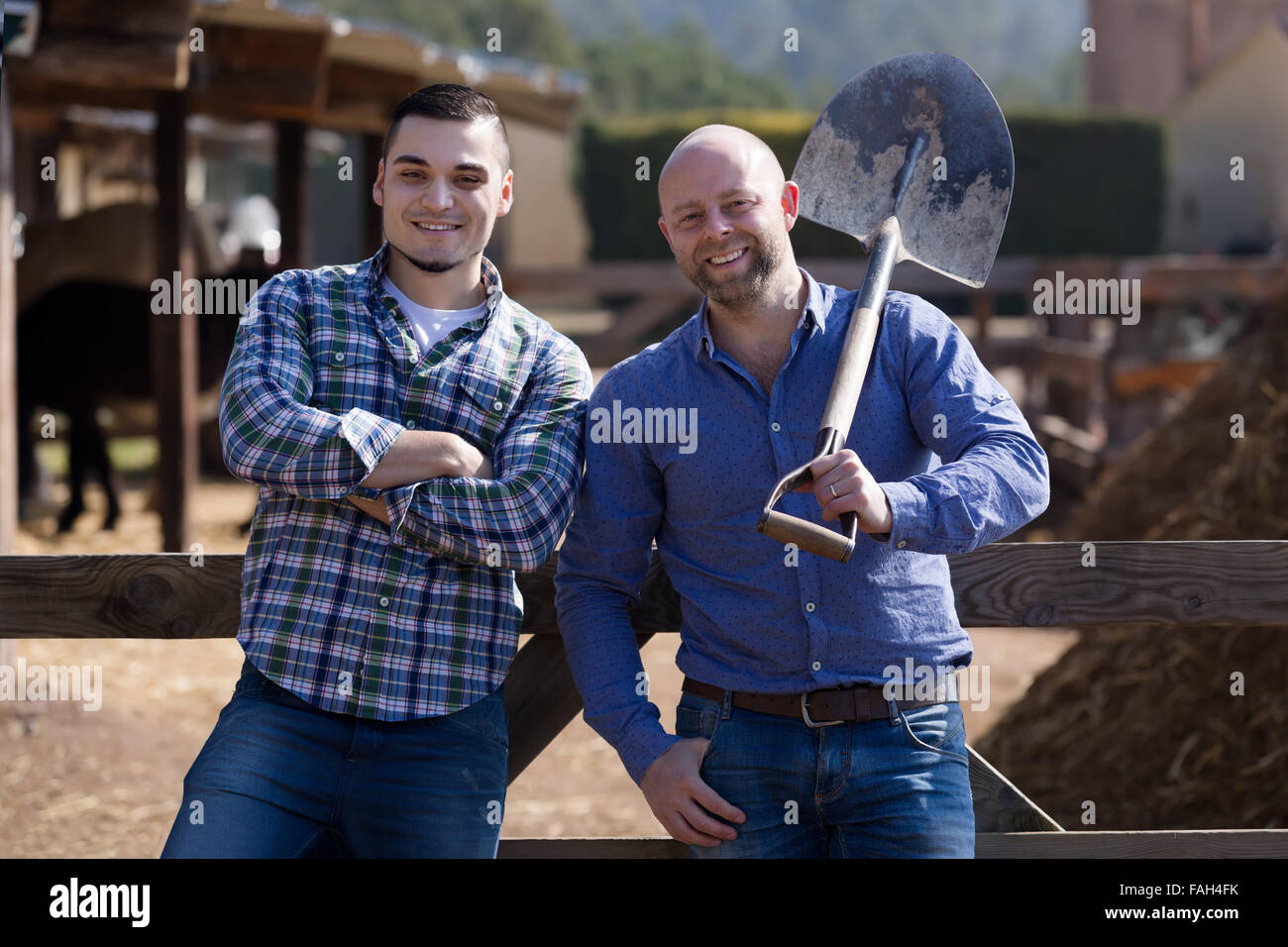 Two men with shovels hi-res stock photography and images - Alamy