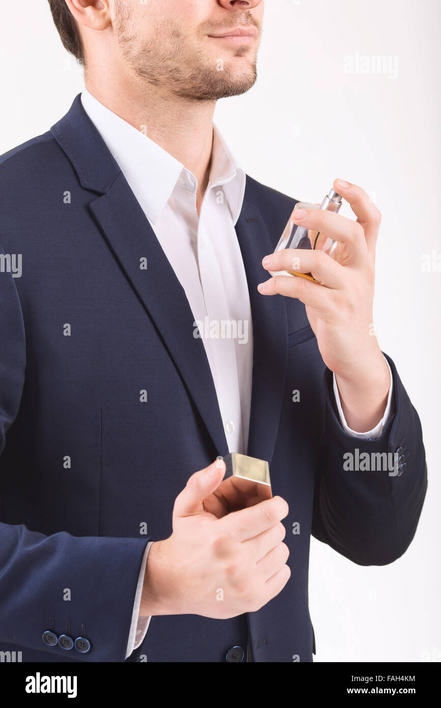 Man spraying perfume hi-res stock photography and images - Alamy