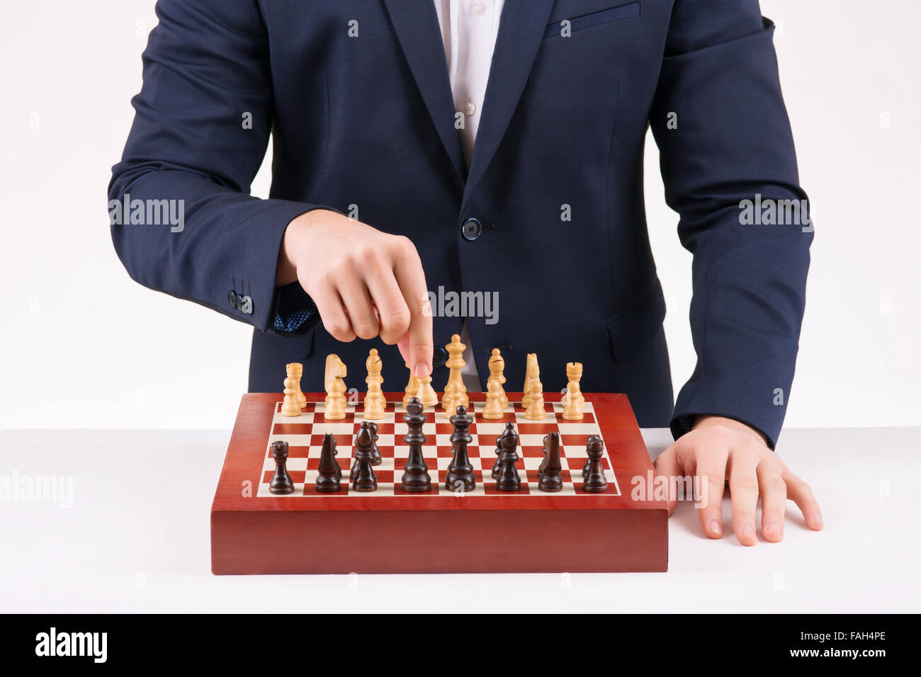 Person playing chess game Stock Photo - Alamy