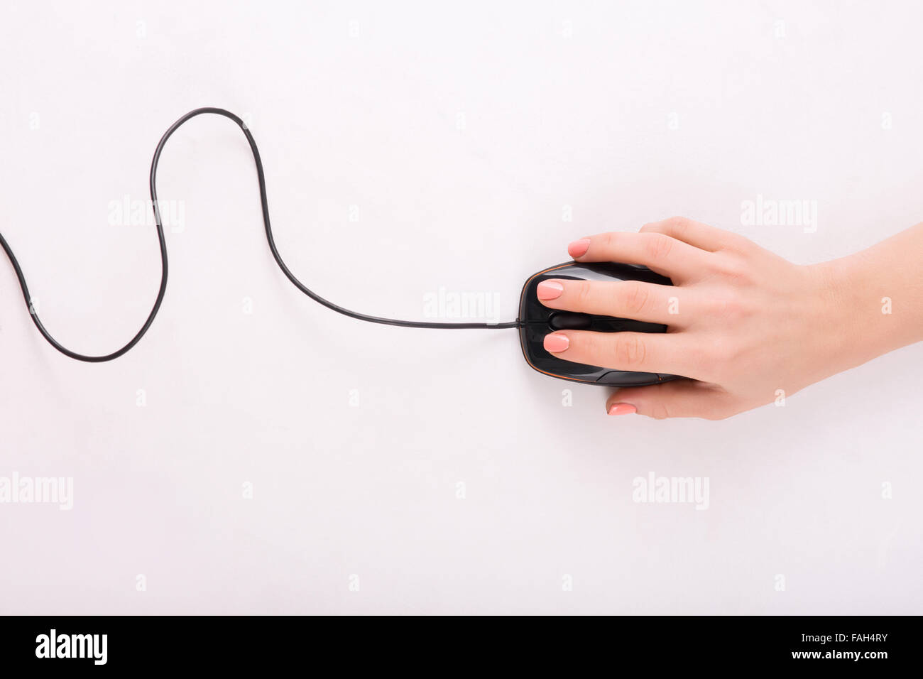Female hand using PC mouse Stock Photo - Alamy