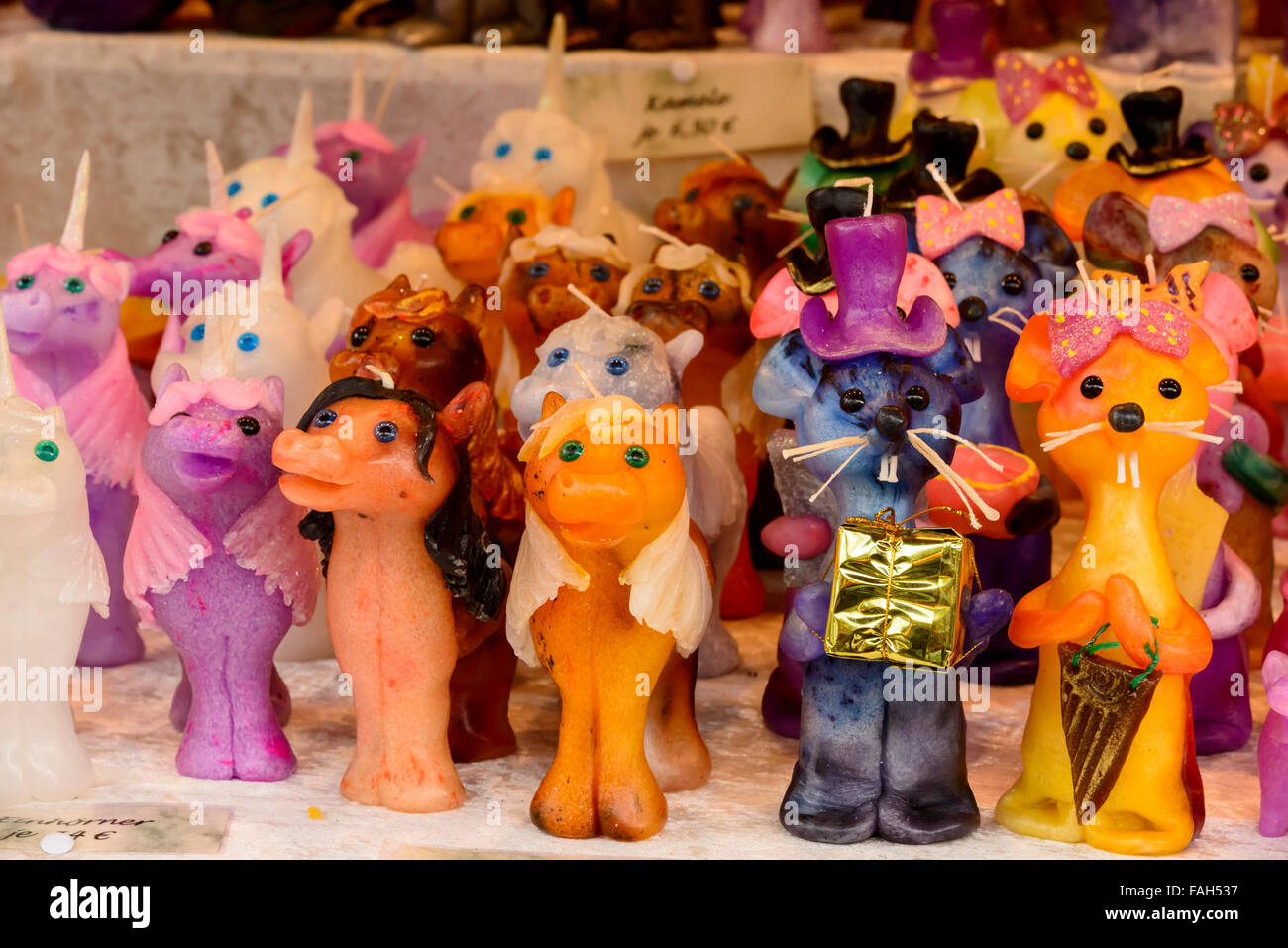 detail of colored puppet candles in Christmas market stall, Stuttgart ...