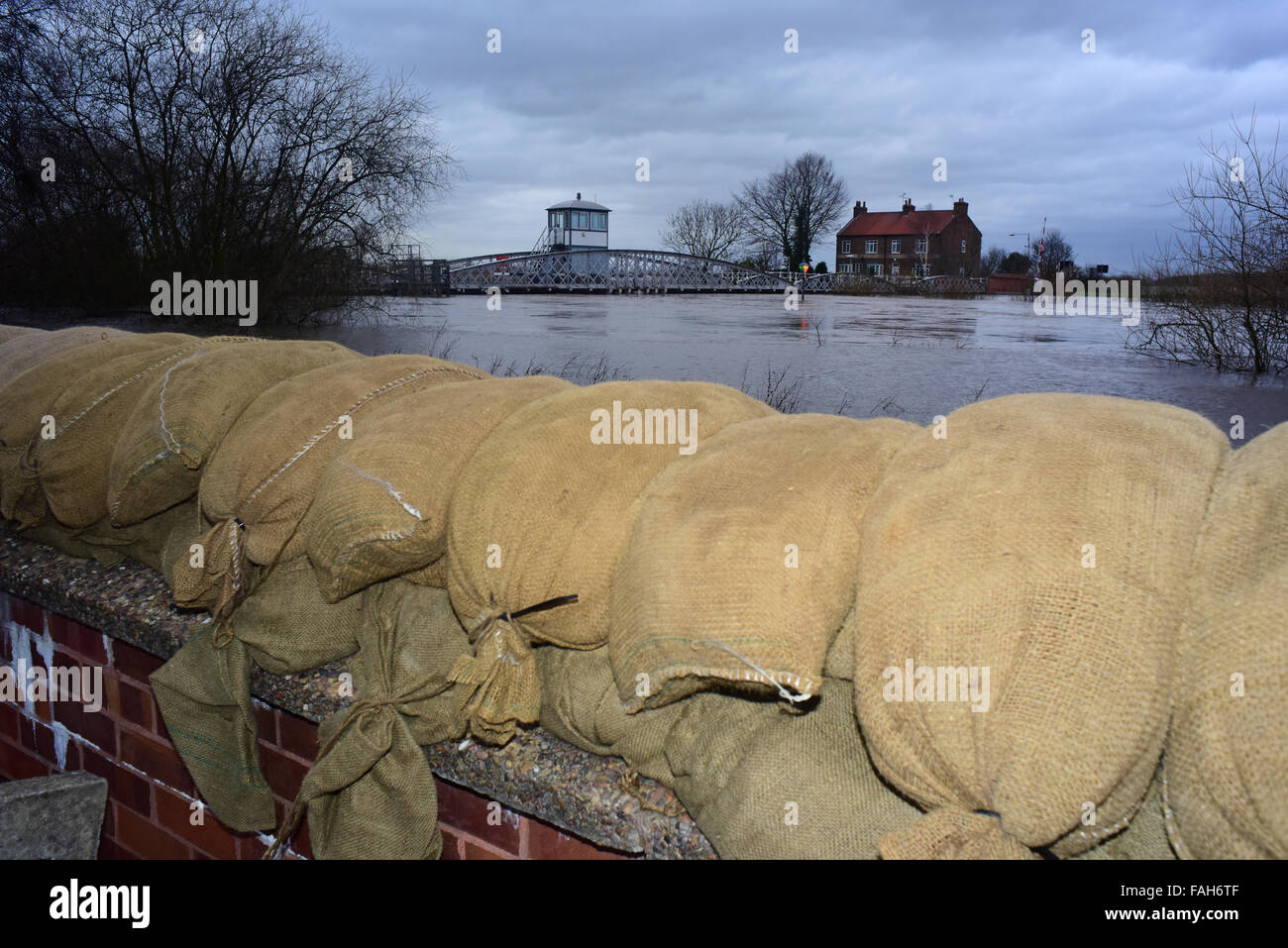 Cawood Bridge, Yorkshire, UK. 30th Dec, 2015. flood defences at flooded ...