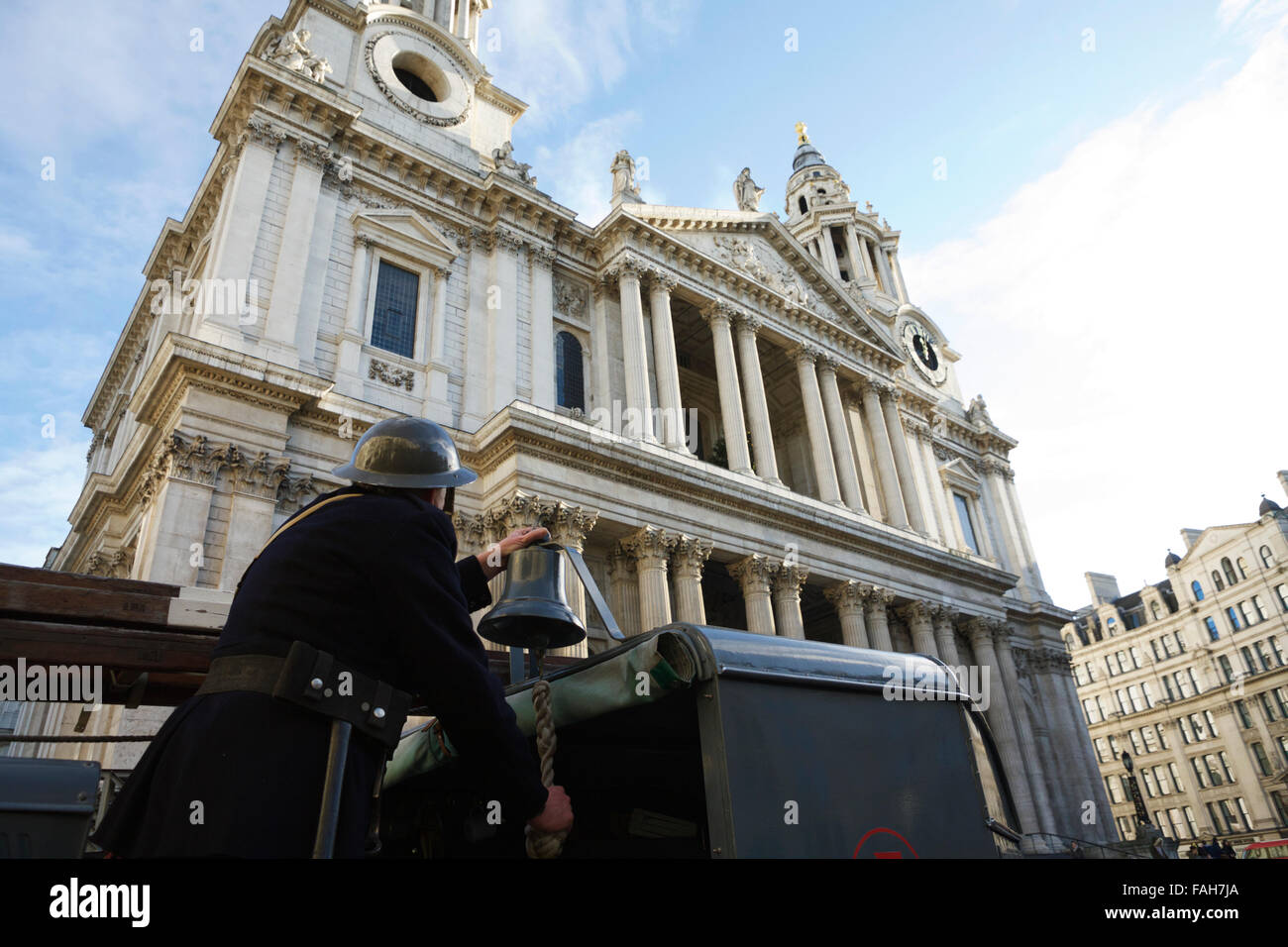 St. Paul's Cathedral, with a WWII fire engine and fireman outside ...