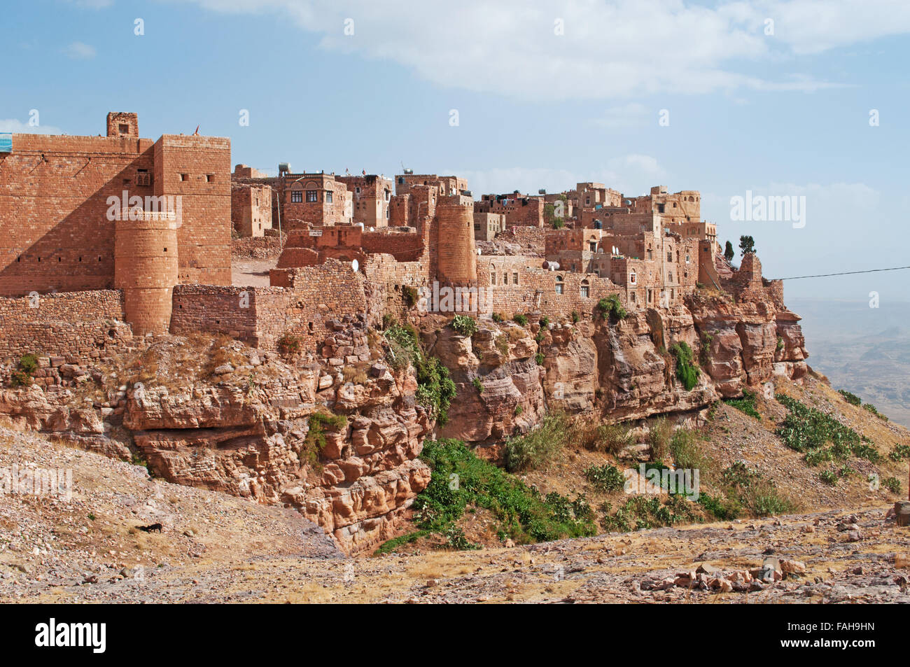 Red rocks and decorated old houses, Kawkaban, northwest of Sana’a ...