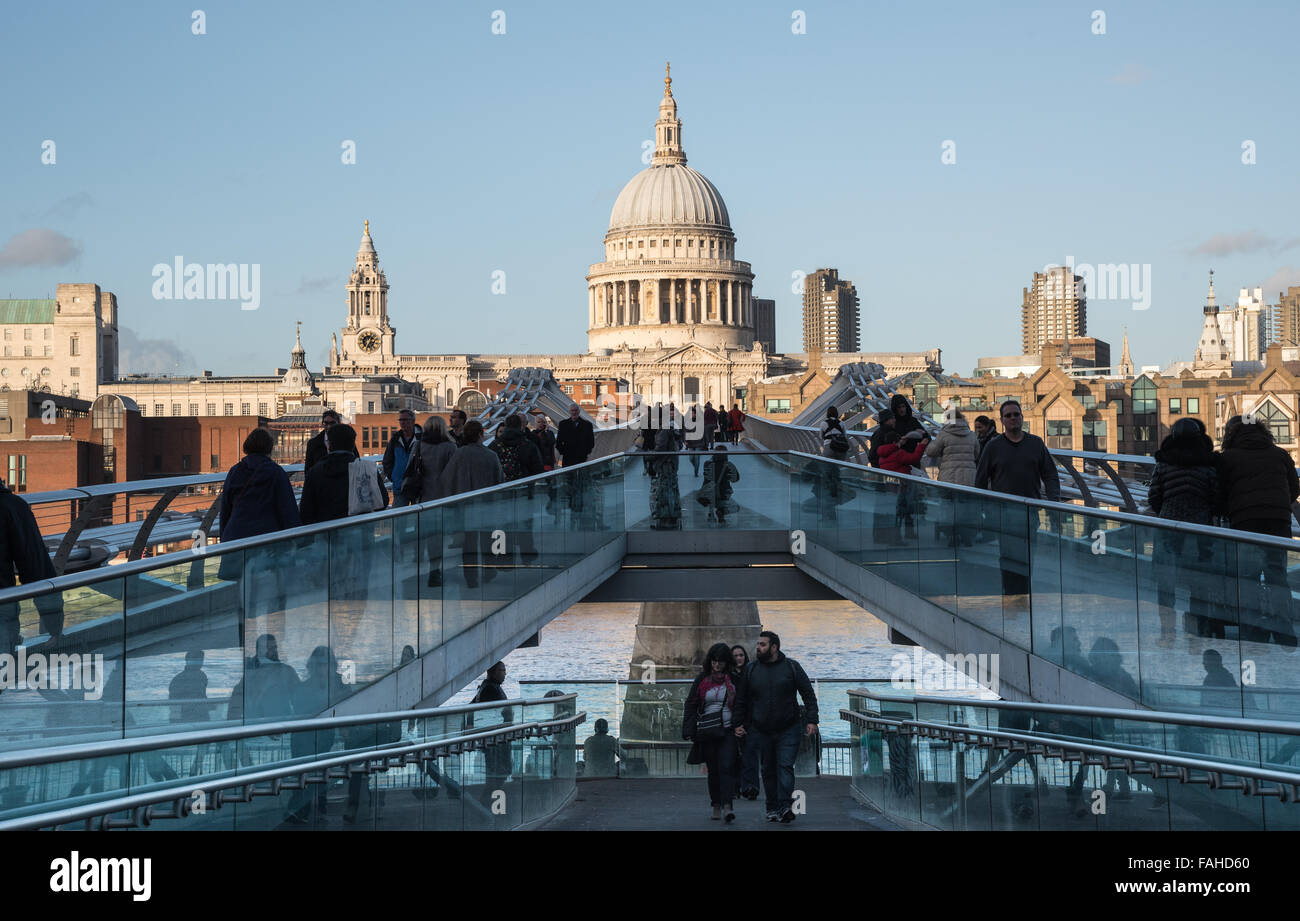 People walking at the Millennium bridge , officially known as the ...