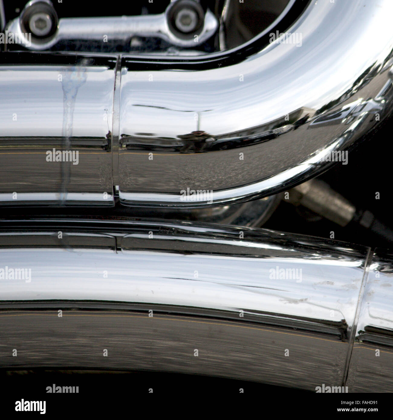 Shiny Motor pipes steel custom Stock Photo - Alamy
