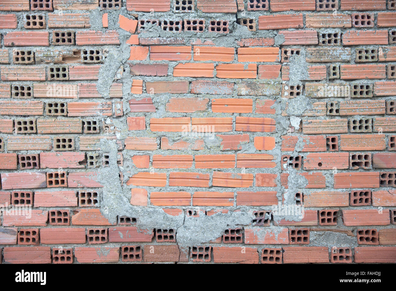 Patched brick wall with concrete hi-res stock photography and images ...