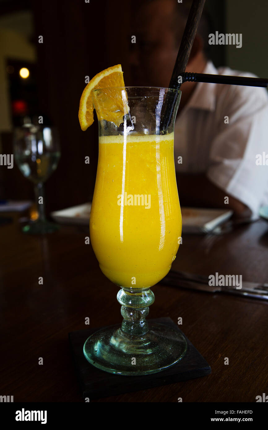 Freshly squeezed orange juice served in a restaurant on the shore of ...