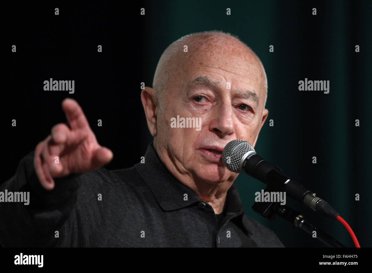 Russian bard and poet Alexander Gorodnitsky performs during his concert ...