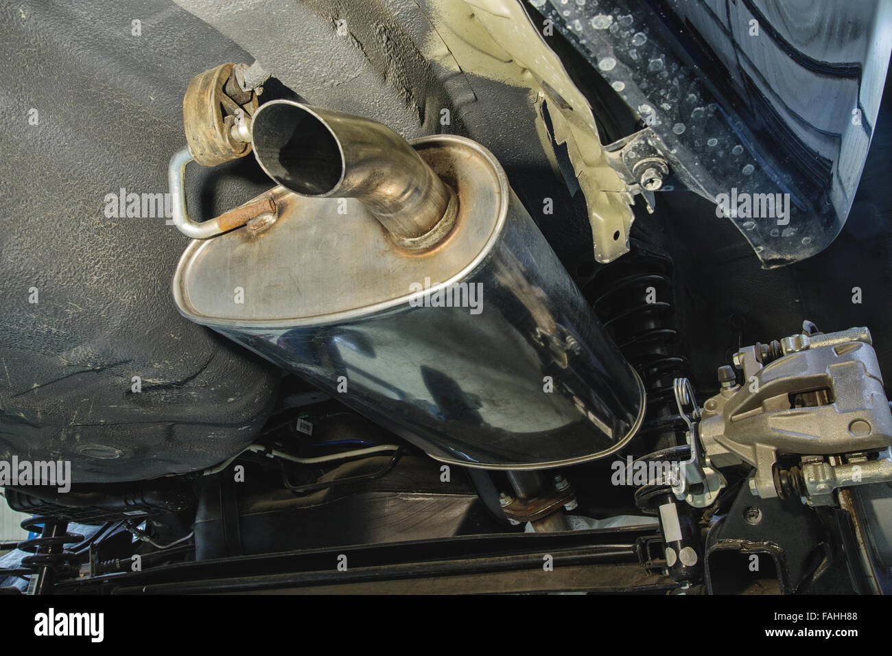 New Car Muffler Stock Photo - Alamy