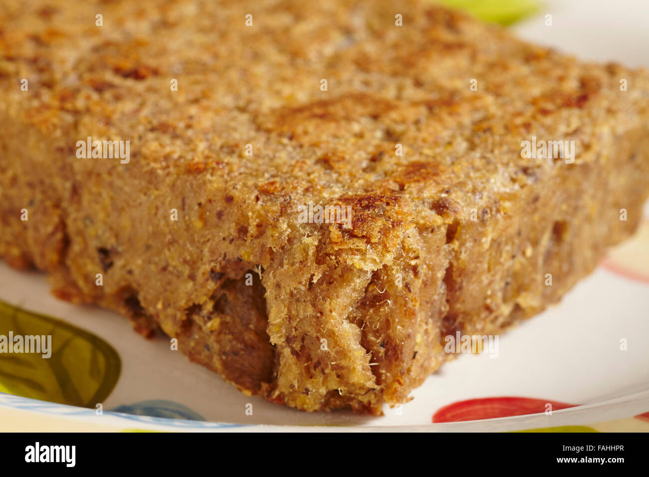 A slice of fried turkey scrapple, a popular local food in Pennsylvania ...