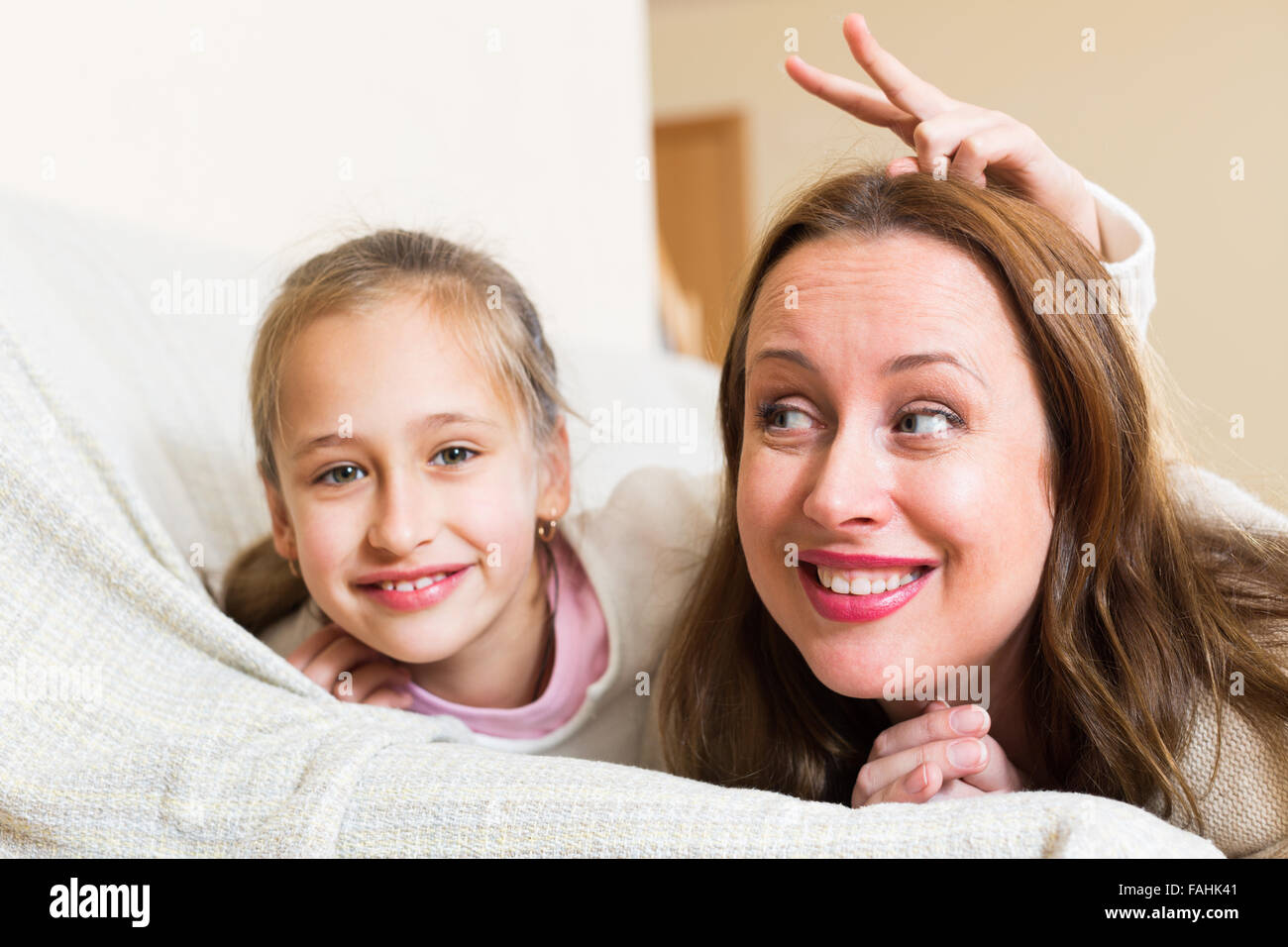 Happy mother hugging embracing little hi-res stock photography and images - Alamy