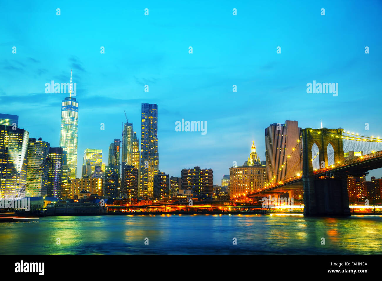 New York City overview with Brooklyn bridge at sunset Stock Photo - Alamy