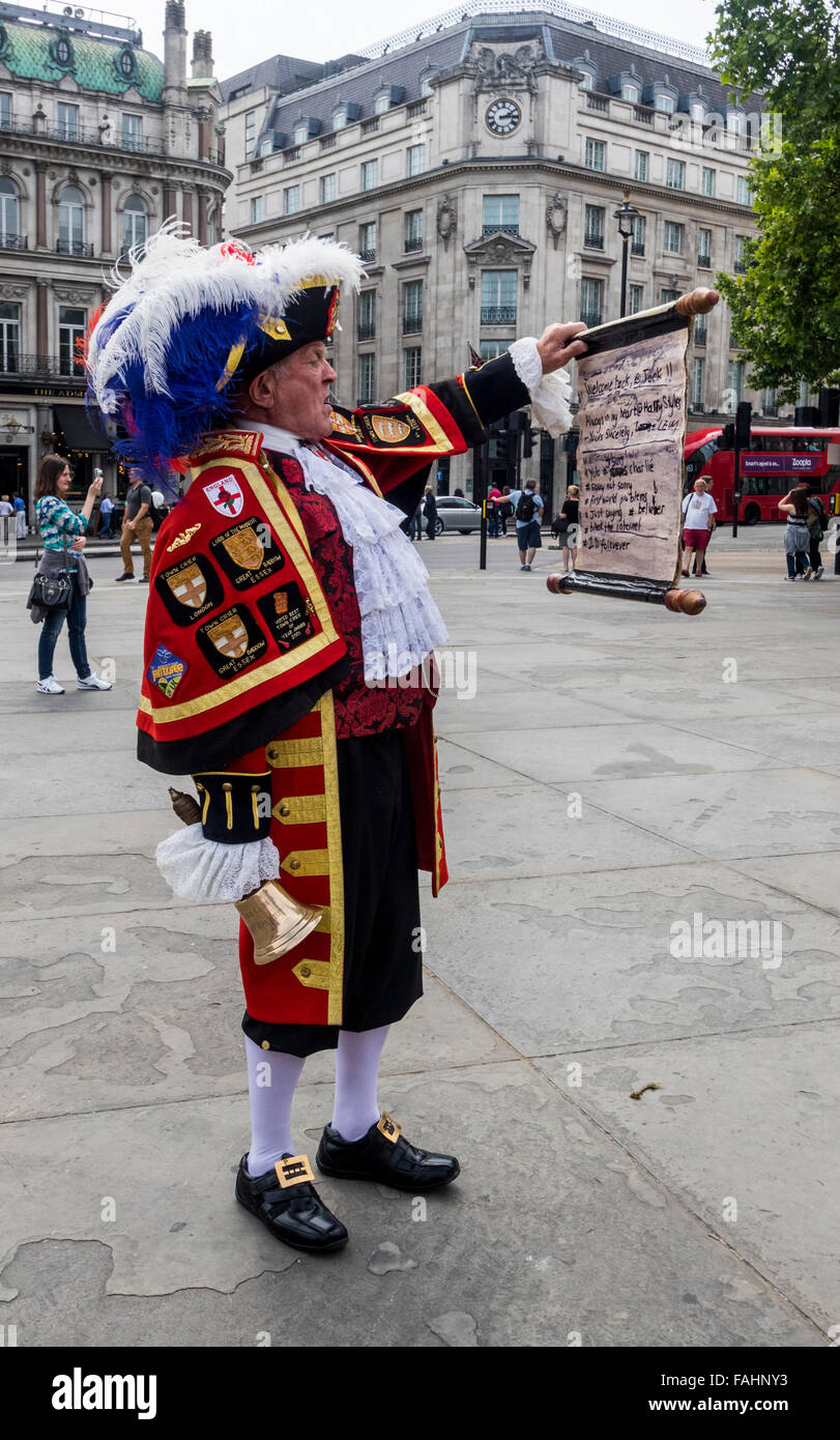 Traditional Town Cryer giving a demonstration of skills needed to ...