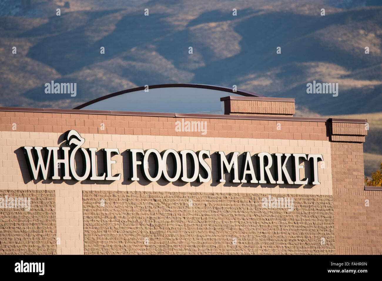 FOOD-Commercial, Whole Foods Store sign with mountains bordering the ...