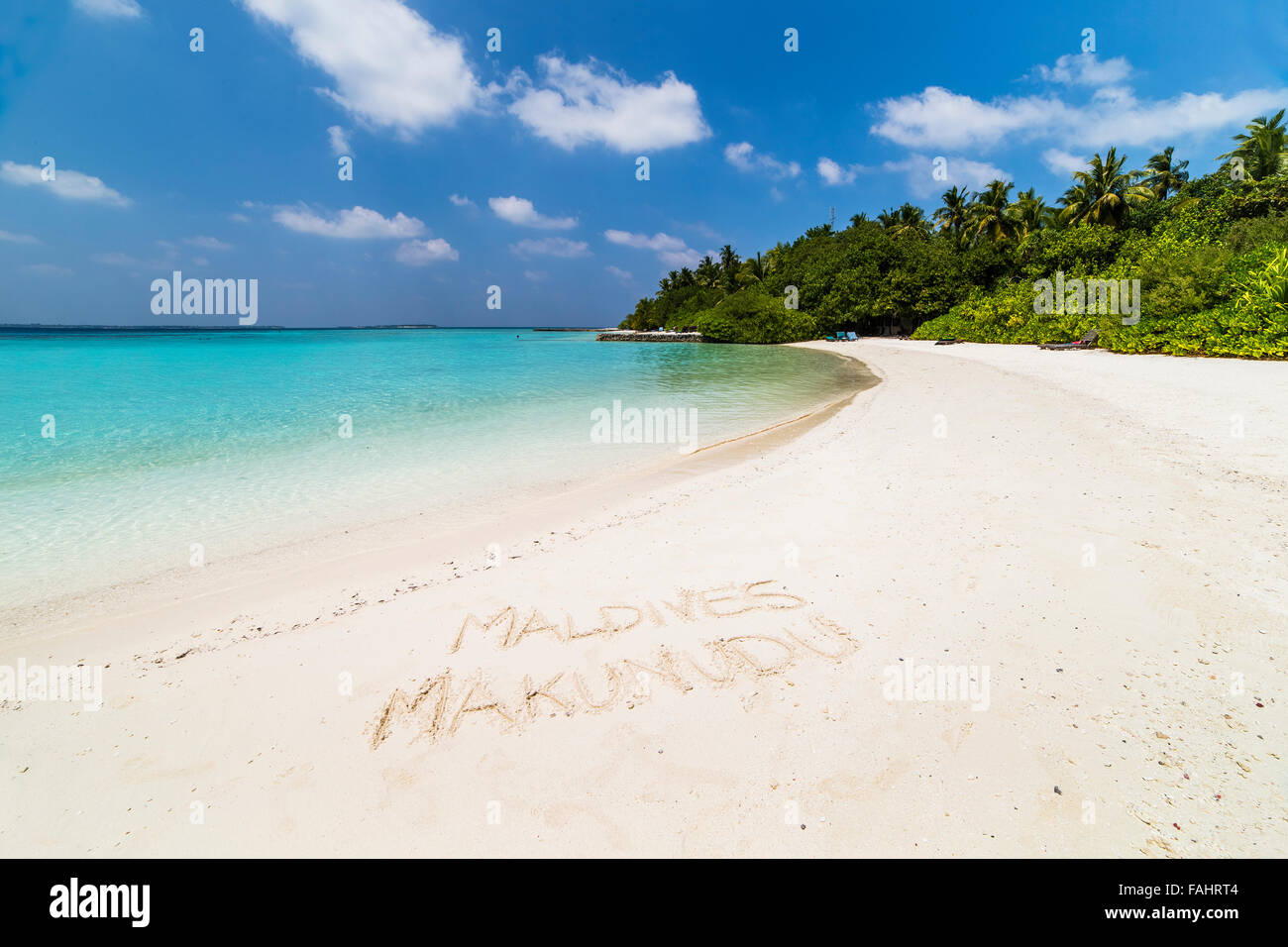A view of the beach at Makunudu Island in the Maldives with writing in ...