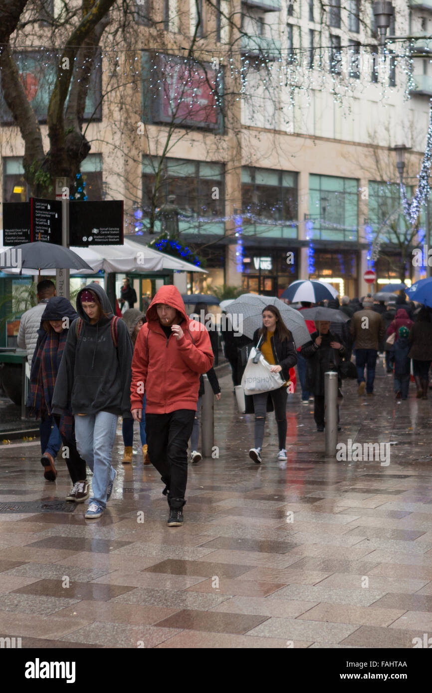 People walking in the rain along the streets of Cardiff Stock Photo - Alamy