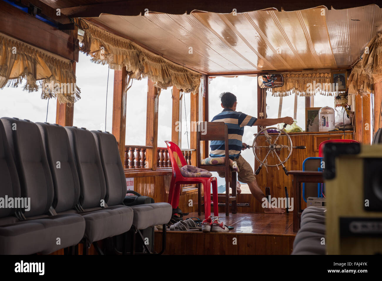 Inside view of a tourist cruising boat. Boat ride is pretty much ...