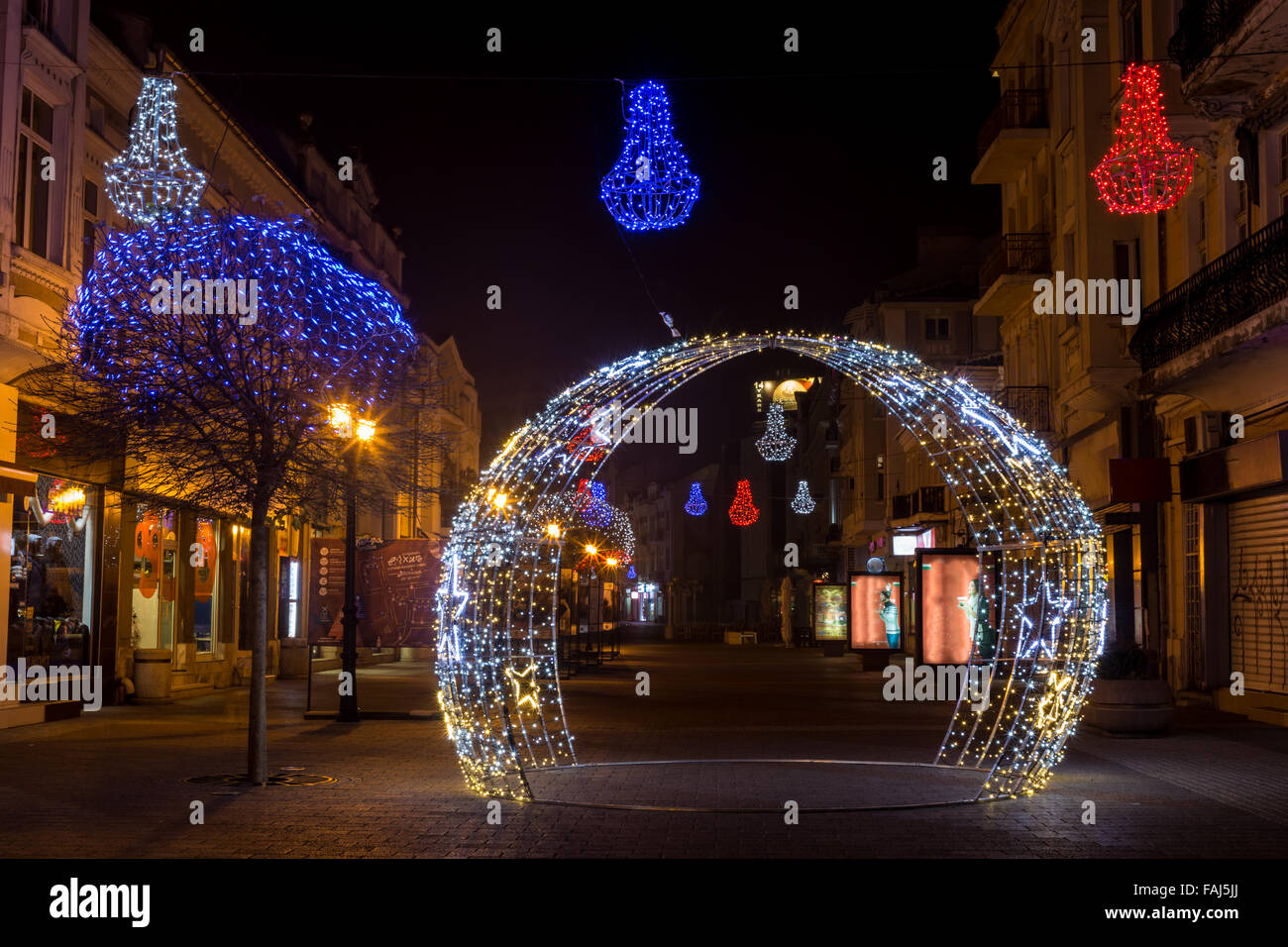 Christmas lights shaped as beautiful arch Stock Photo - Alamy