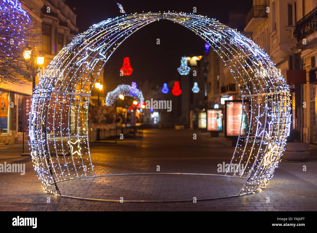 Christmas lights shaped as beautiful arch Stock Photo - Alamy