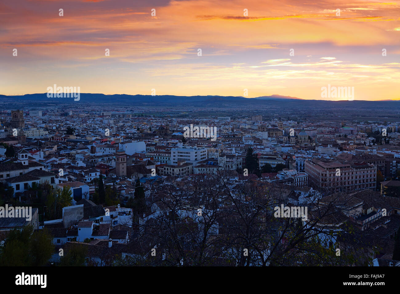 Top view of Granada in sunset from mount. Spain. Focus on lantern Stock ...