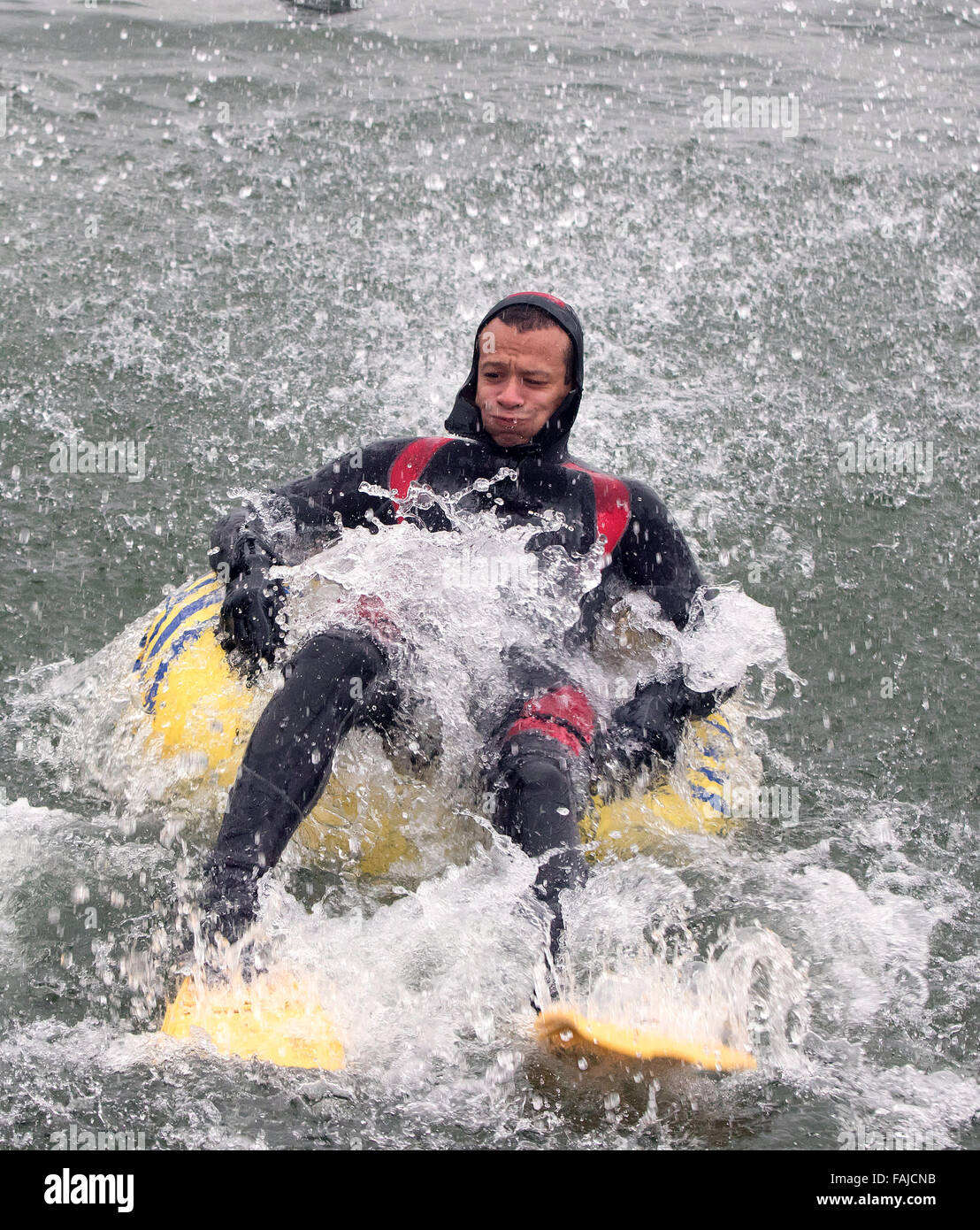 Mainz, Germany. 31st Dec, 2015. A diver in a wetsuit floating in the ...
