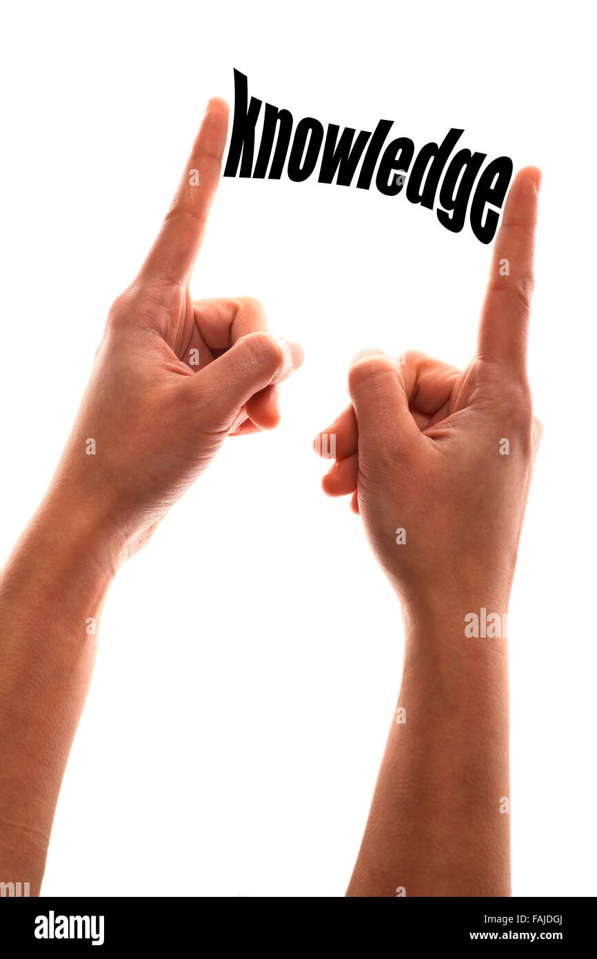 Color vertical shot of a of a hand squeezing the word "knowledge Stock ...