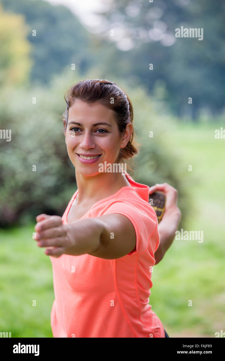 Girl exercise in park Stock Photo - Alamy