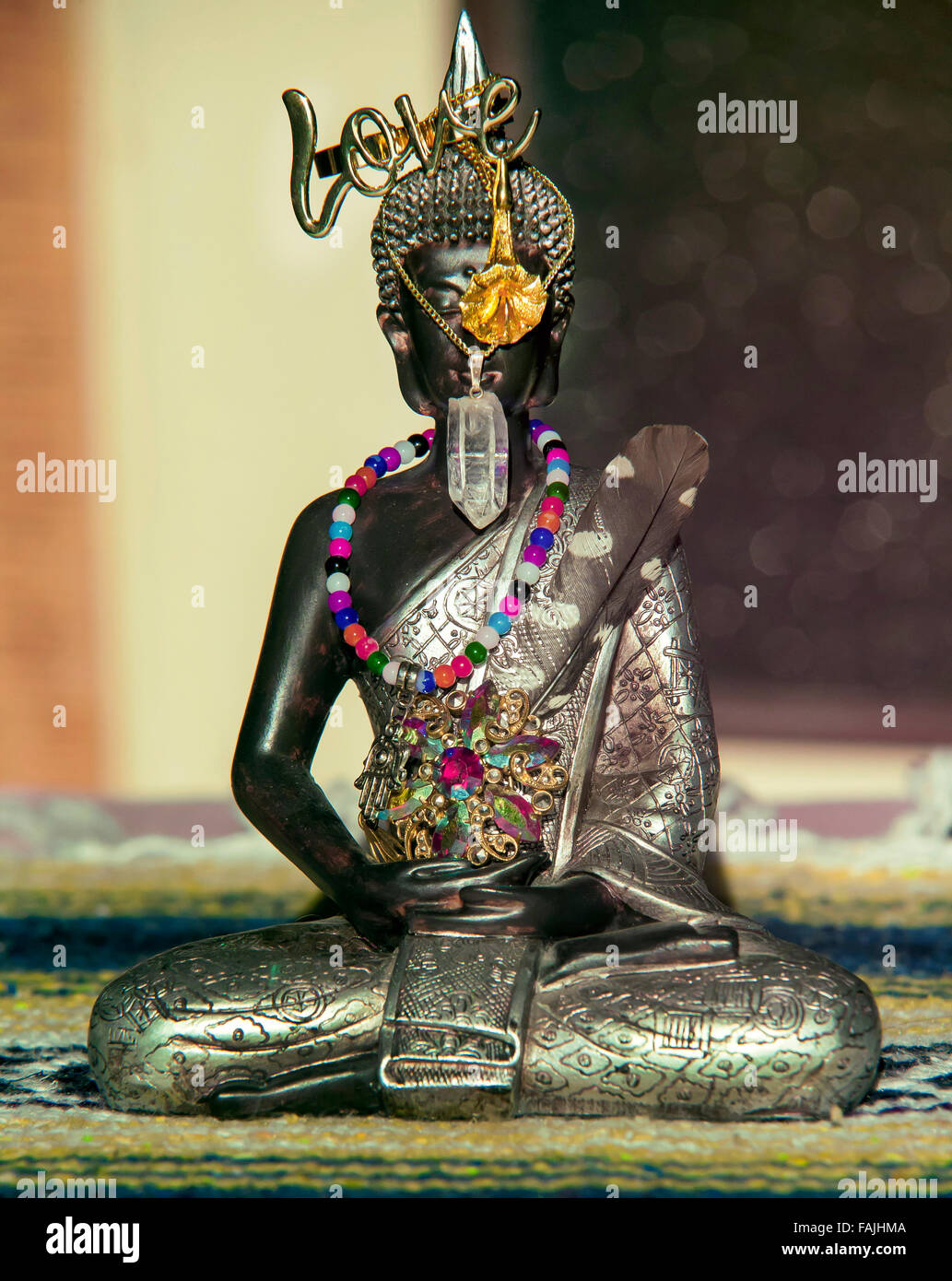 Jewelry holder Buddha statue Stock Photo - Alamy