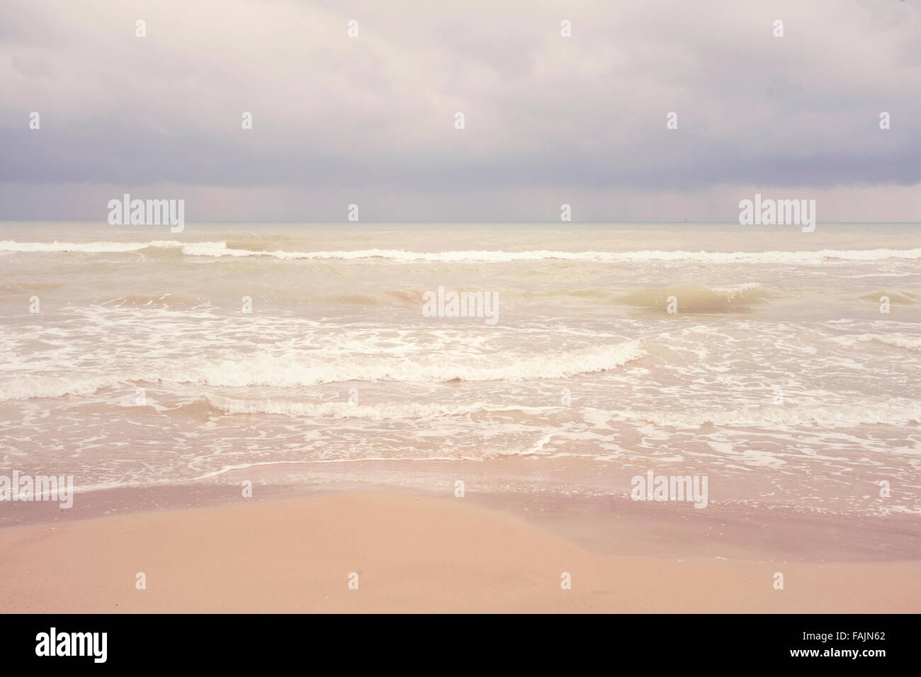 Calm bright sea shore Stock Photo - Alamy