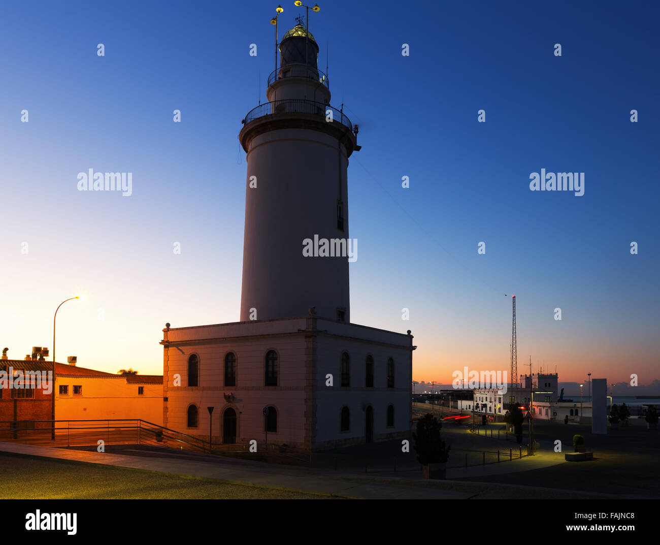 Beacon at Malaga in sunset. Spain Stock Photo - Alamy
